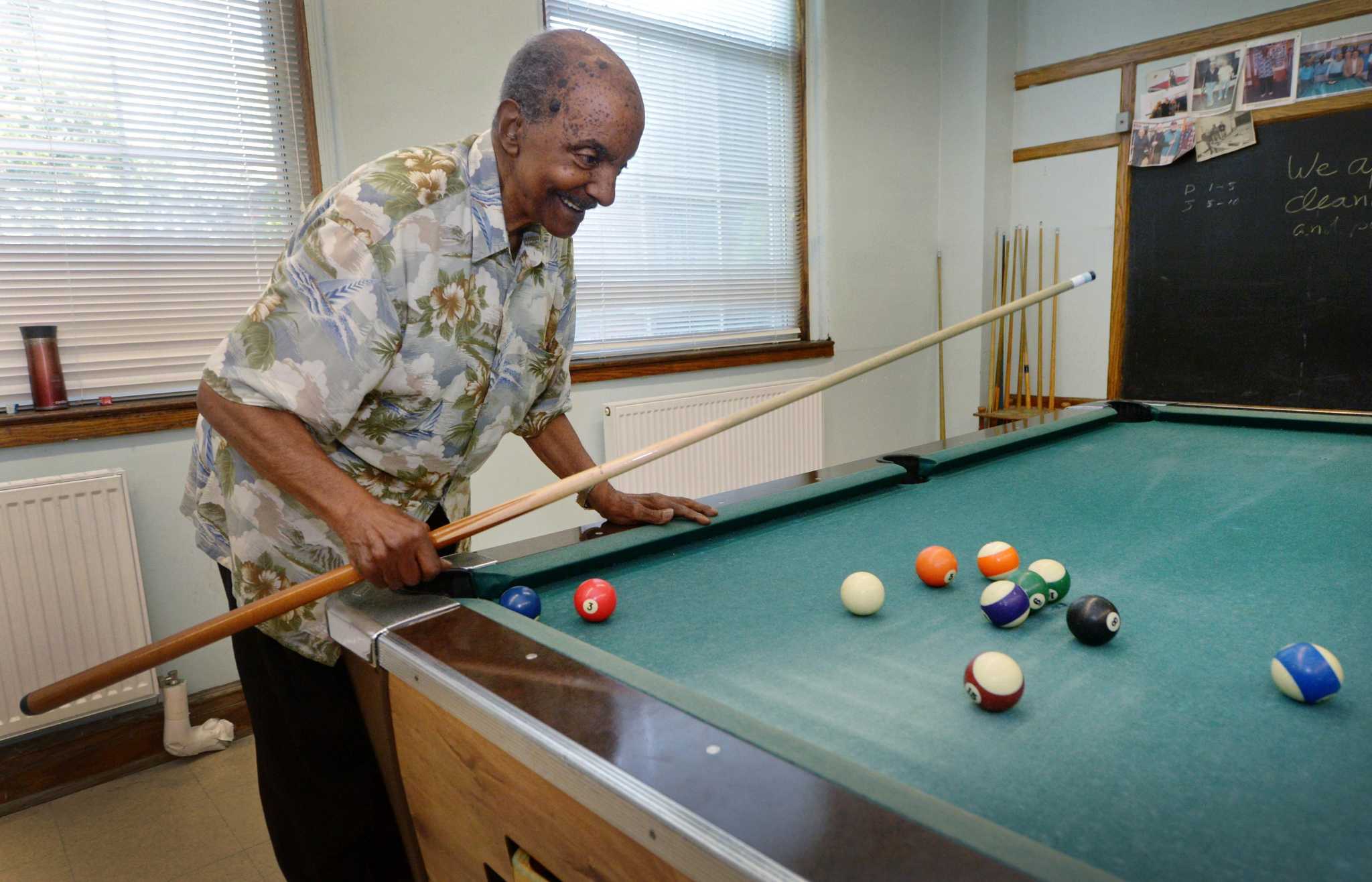 Norwalk pool shark Tam Dickson celebrates 90