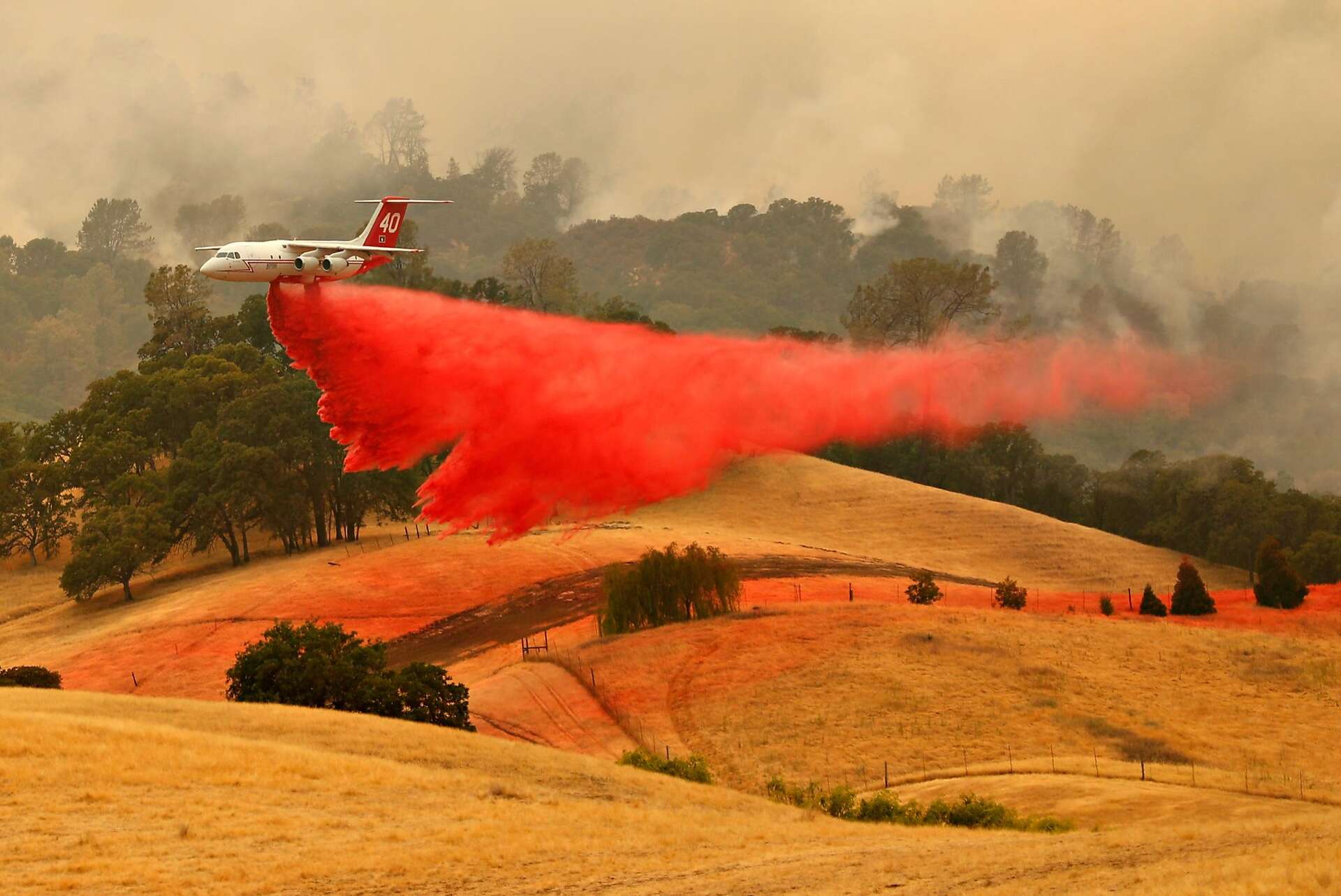 County Fire ‘growing a lot faster’ than past blazes, spreads glow and ...