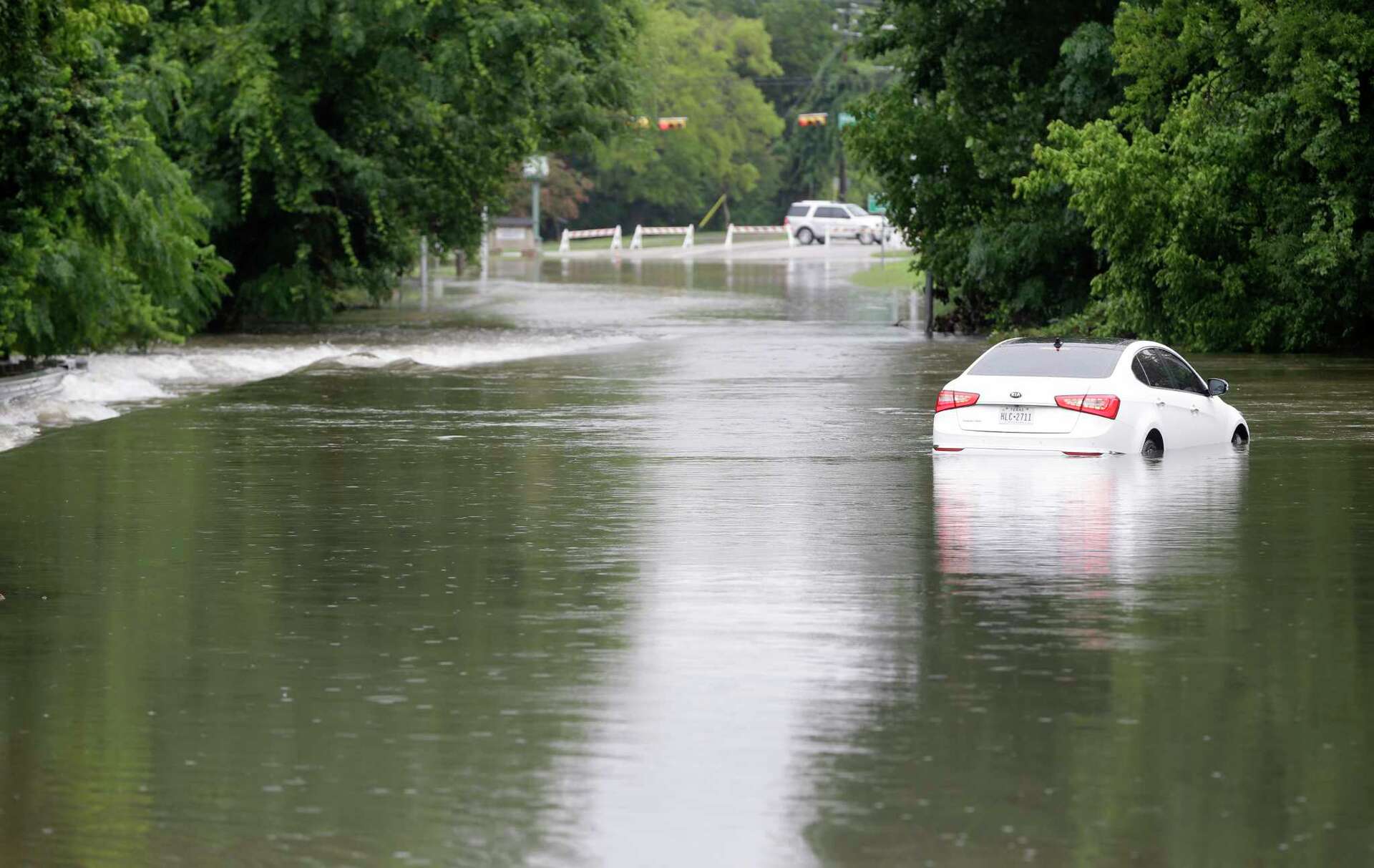 Quick-rising water sparks flash flooding in Houston on soggy Fourth of July
