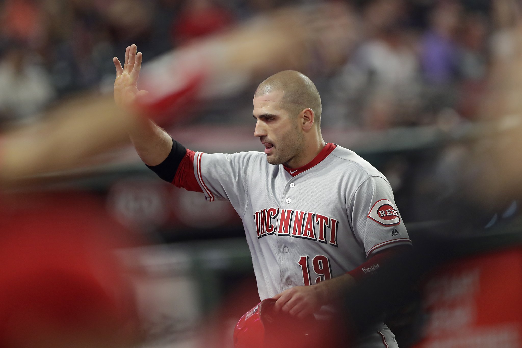 Reds score 7 runs with 2 outs in 9th to beat Cleveland