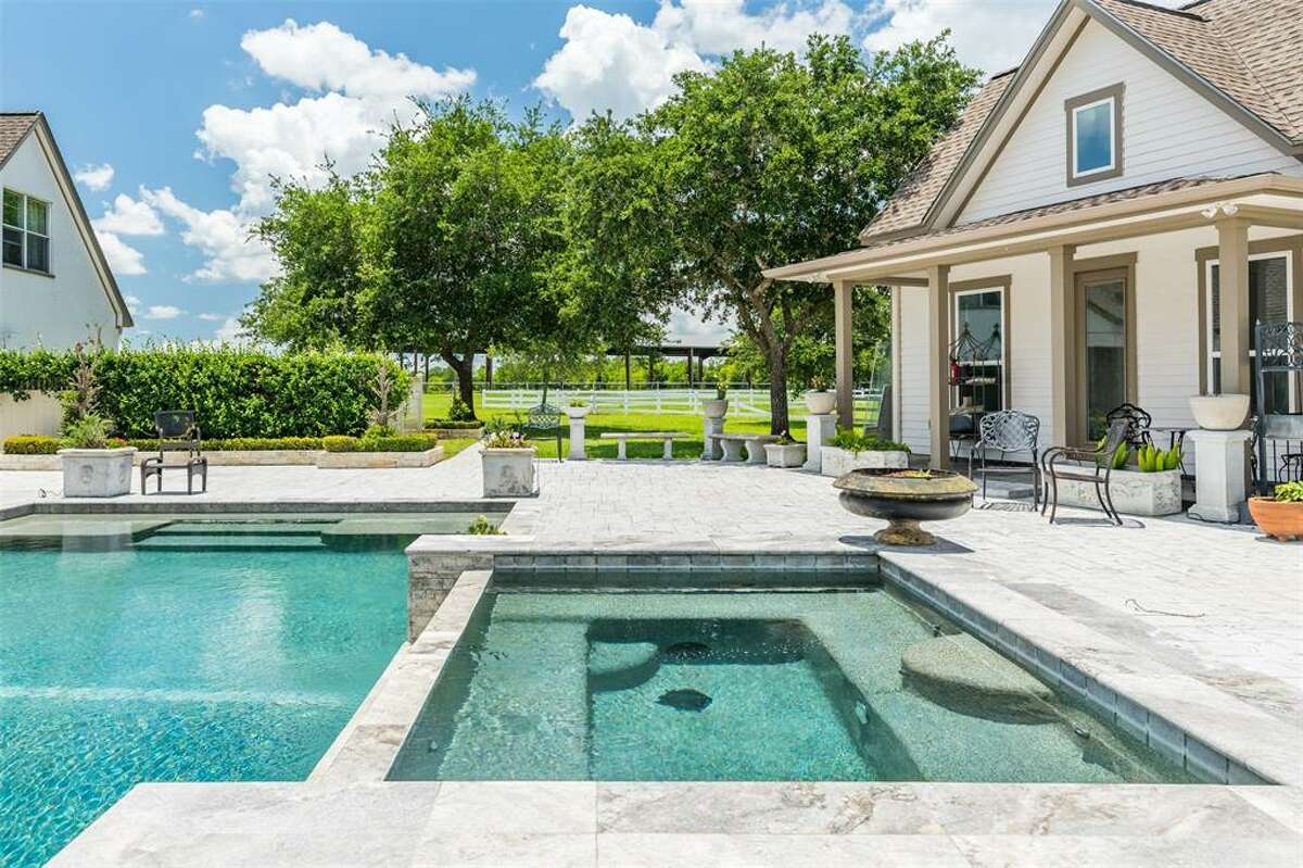 Start your own little village at this Angleton ranch for sale