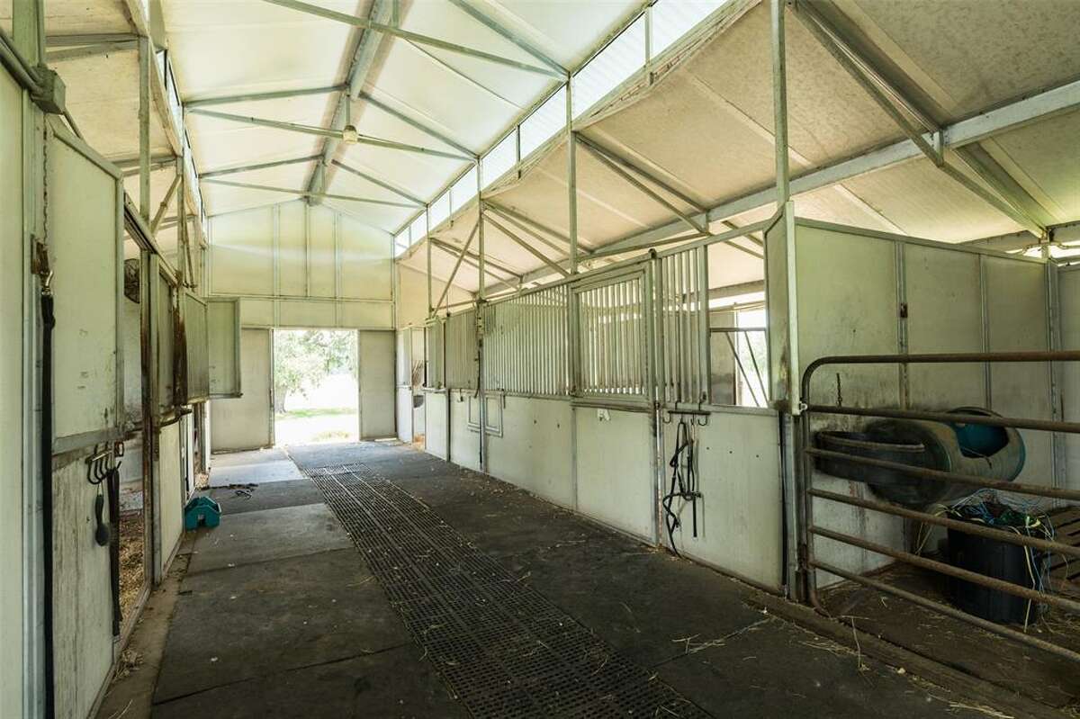 Start your own little village at this Angleton ranch for sale