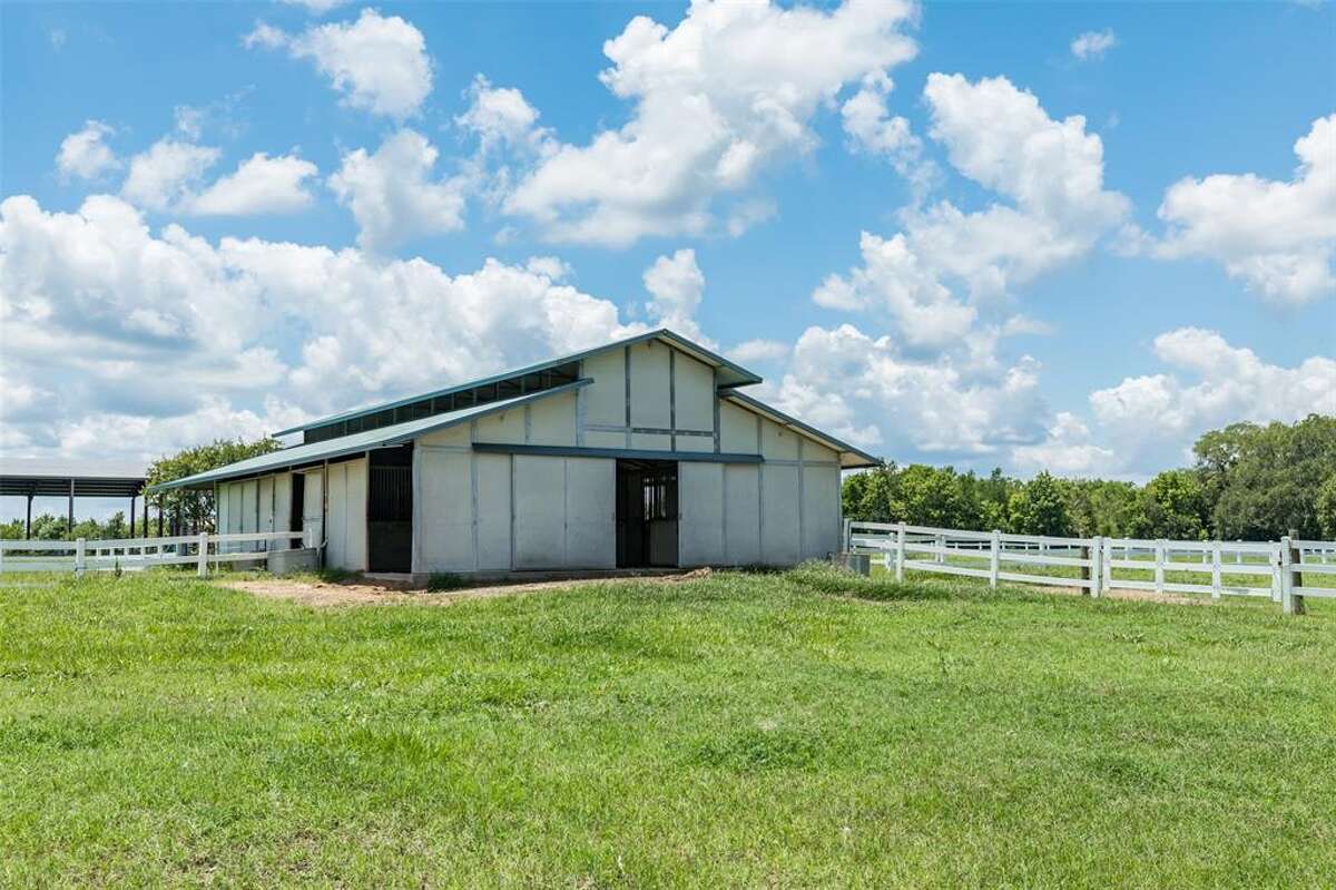 Start your own little village at this Angleton ranch for sale