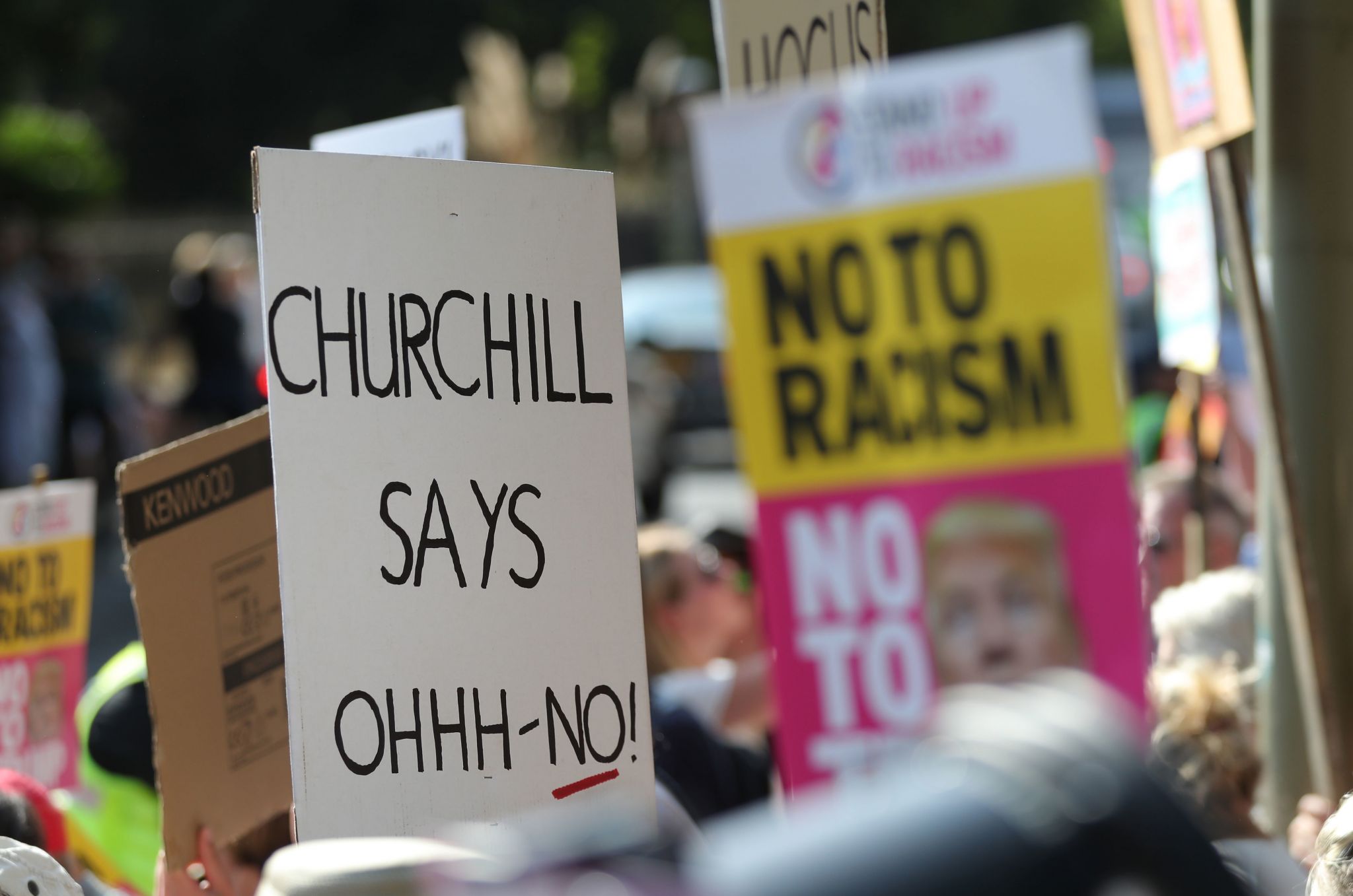 Very British Trump protest signs