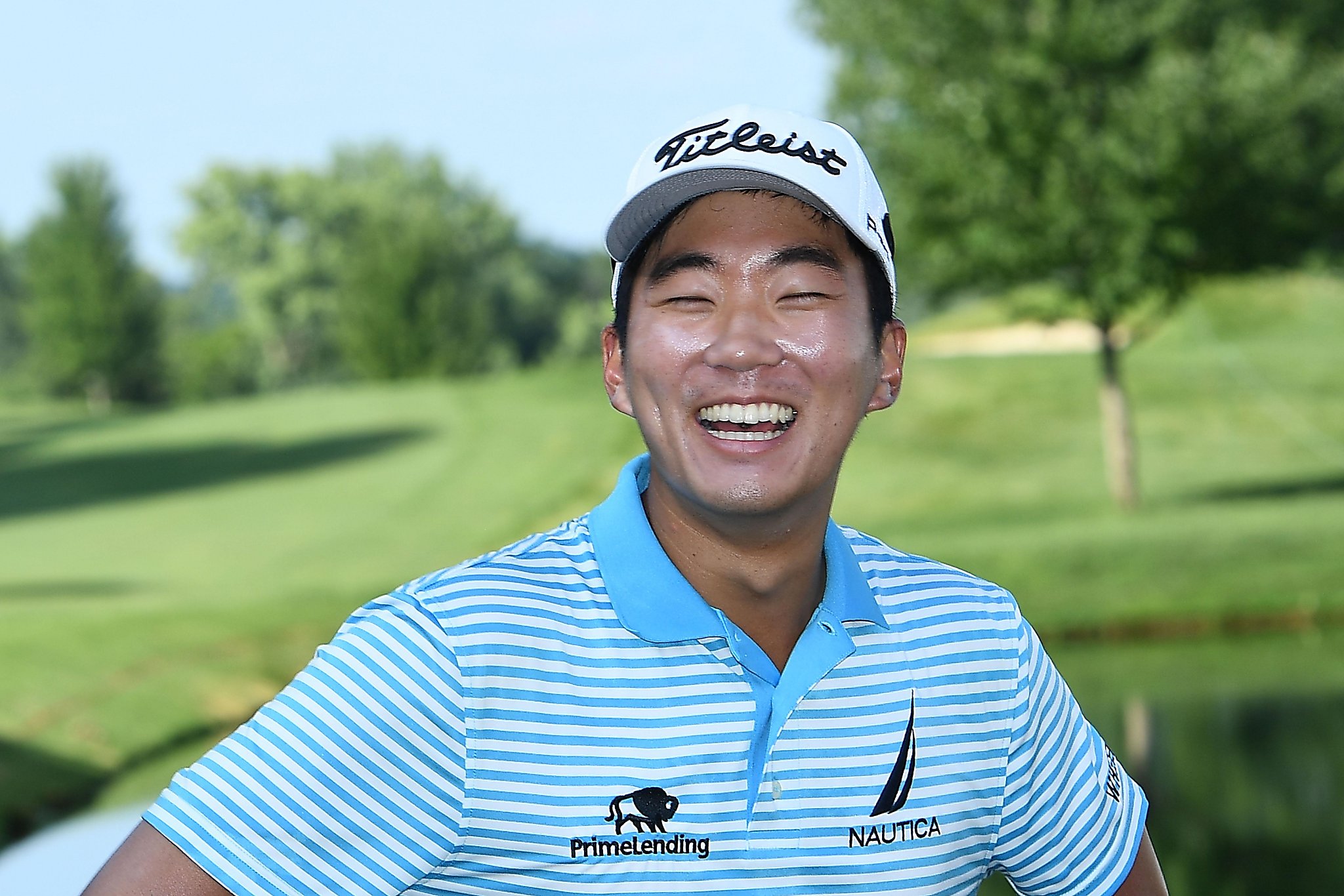 Michael Kim wins John Deere Classic in record-breaking runaway