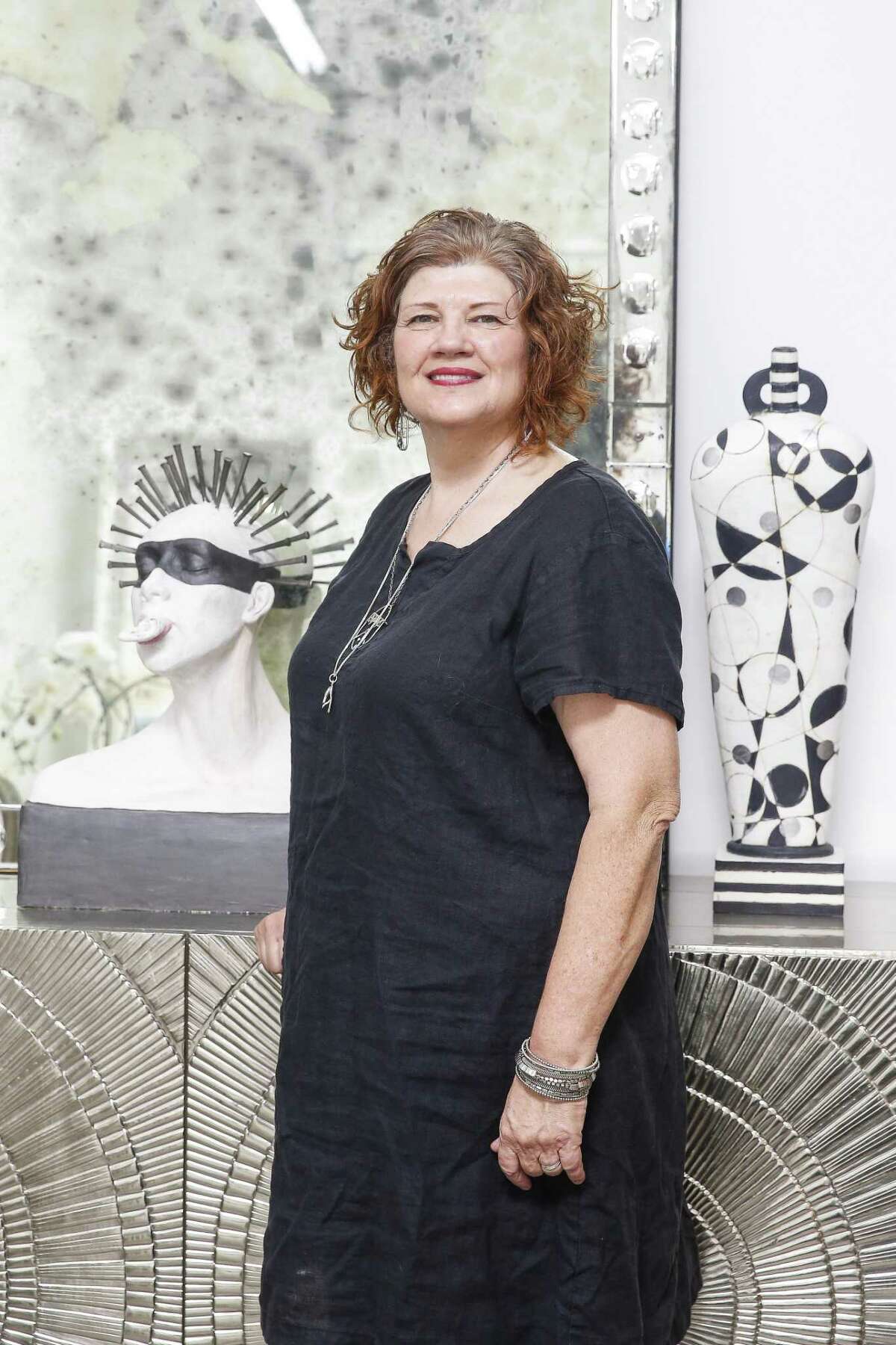What could four Houston design teams do with a gray sofa and cool art ...