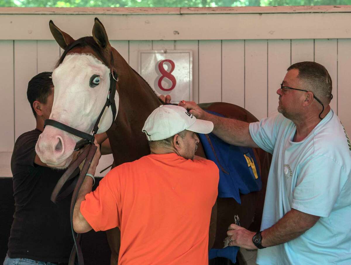 Photos: Last-minute track prep before racing season starts Friday