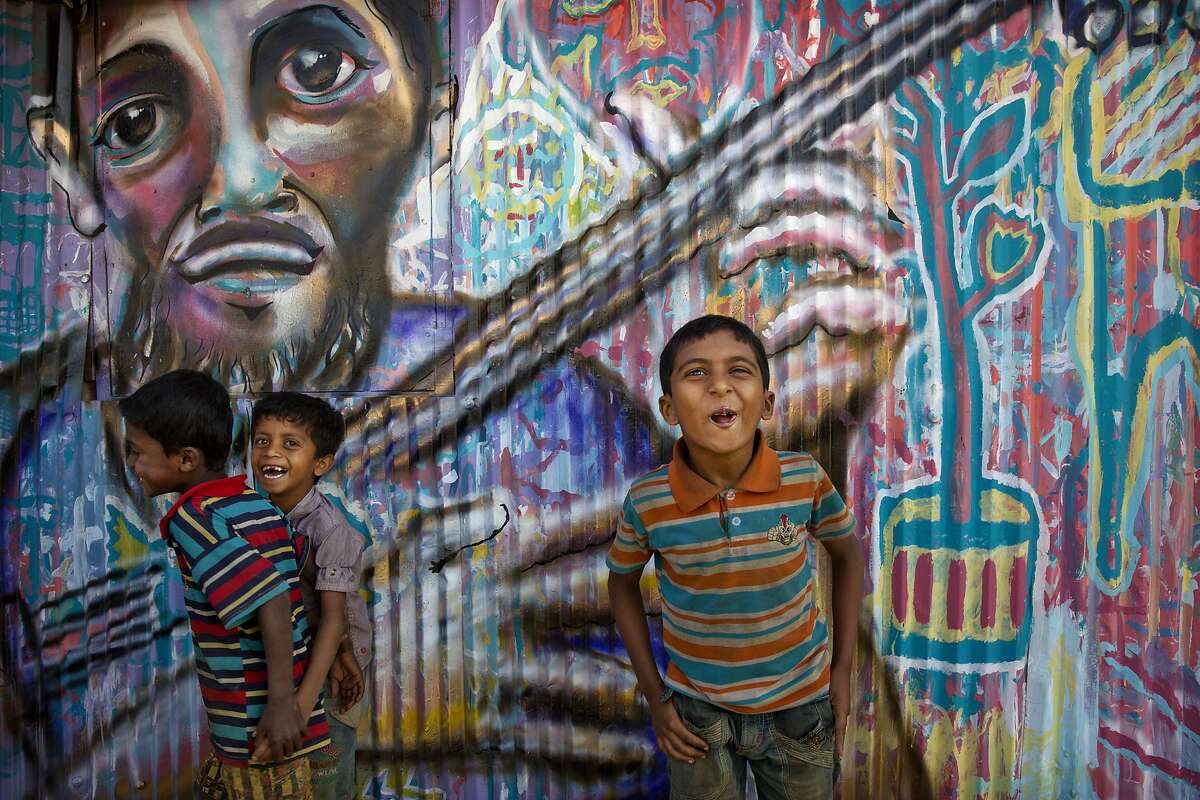 Murals provide balm in dismal refugee camps in Bangladesh