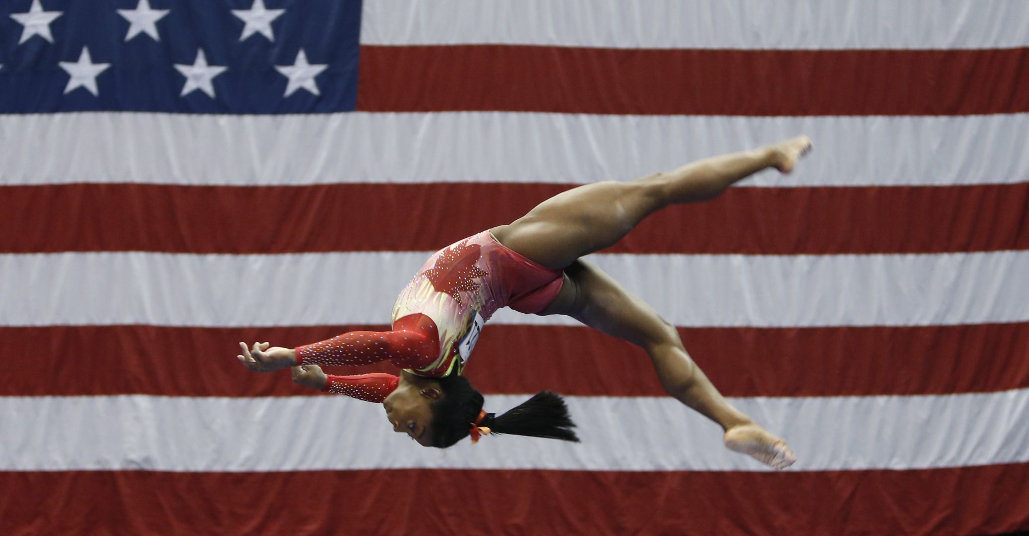 Olympic champ Simone Biles triumphs in return to competition