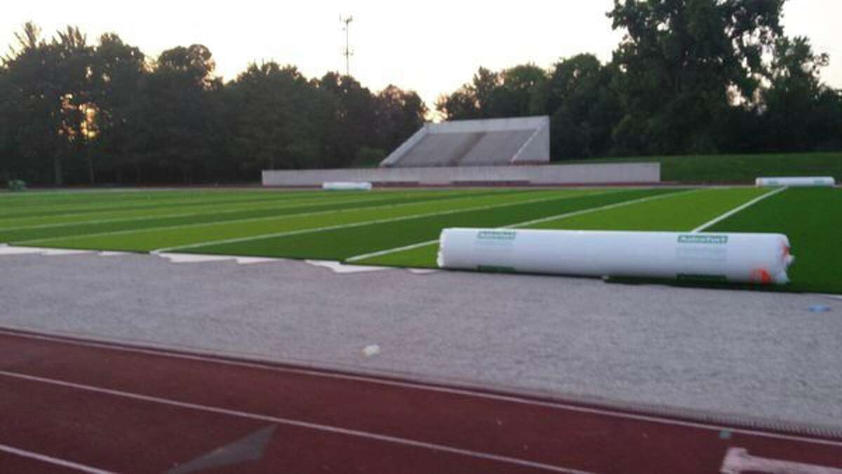 NU football field finally gets artificial turf