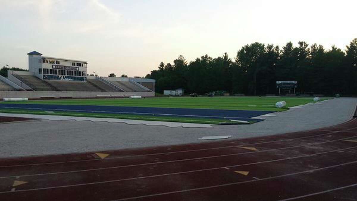 NU football field finally gets artificial turf