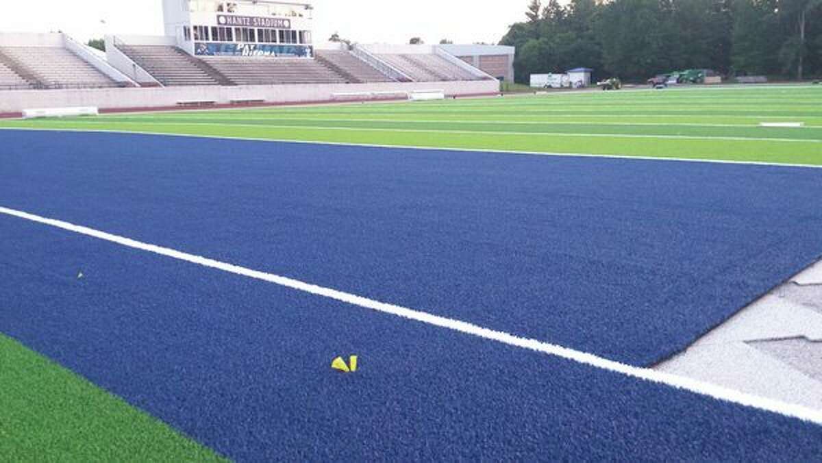 NU football field finally gets artificial turf