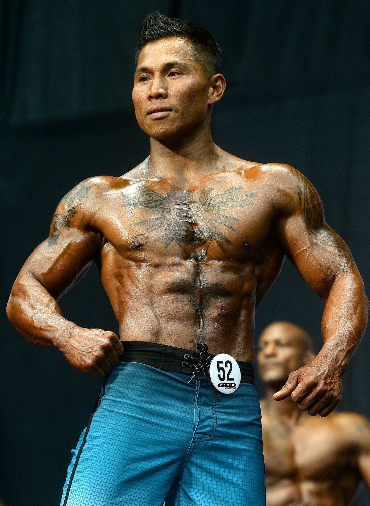 Photos: Bodybuilders show their strengths at Global Championships