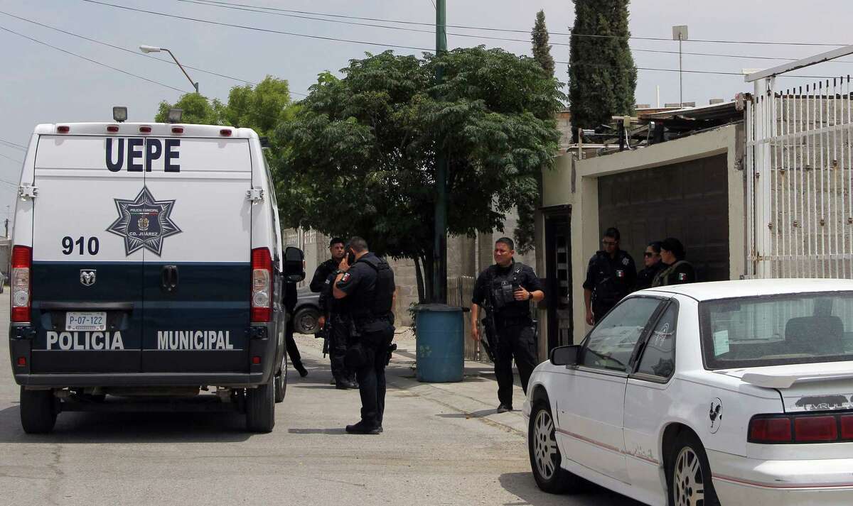 Mexico announces arrests in killings of 11 at home in Juarez