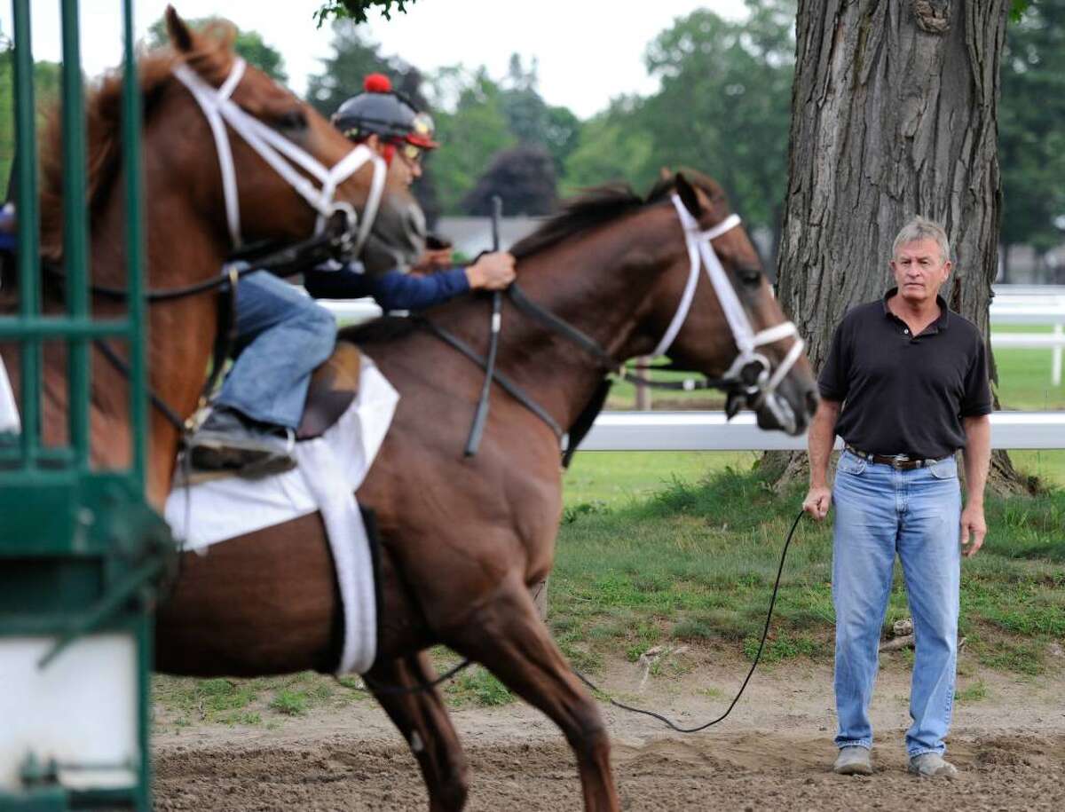 Bob Duncan guides horses with a gentle hand for the Saratoga meet