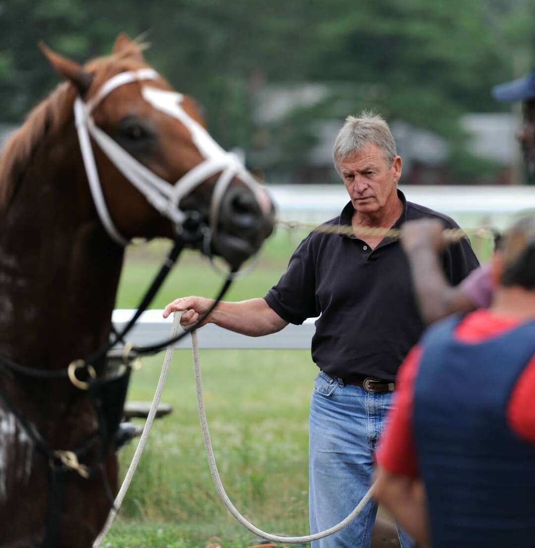 Bob Duncan guides horses with a gentle hand for the Saratoga meet