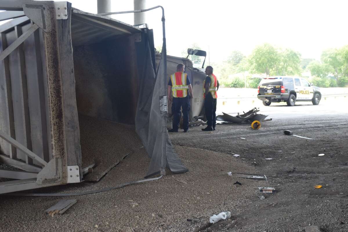 Driver hospitalized after gravel truck overturns on U.S. 90 exit ...