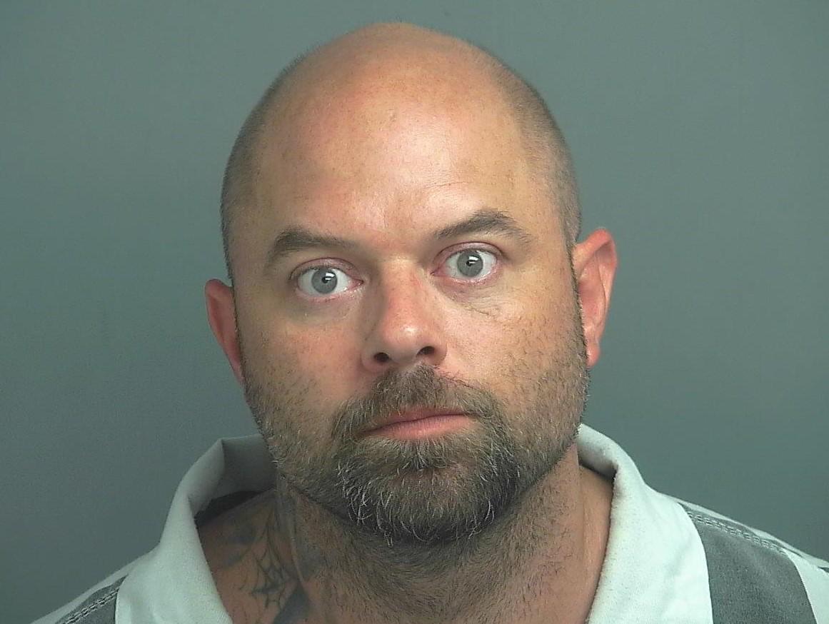 Magnolia man charged after drugs and guns discovered during traffic stop