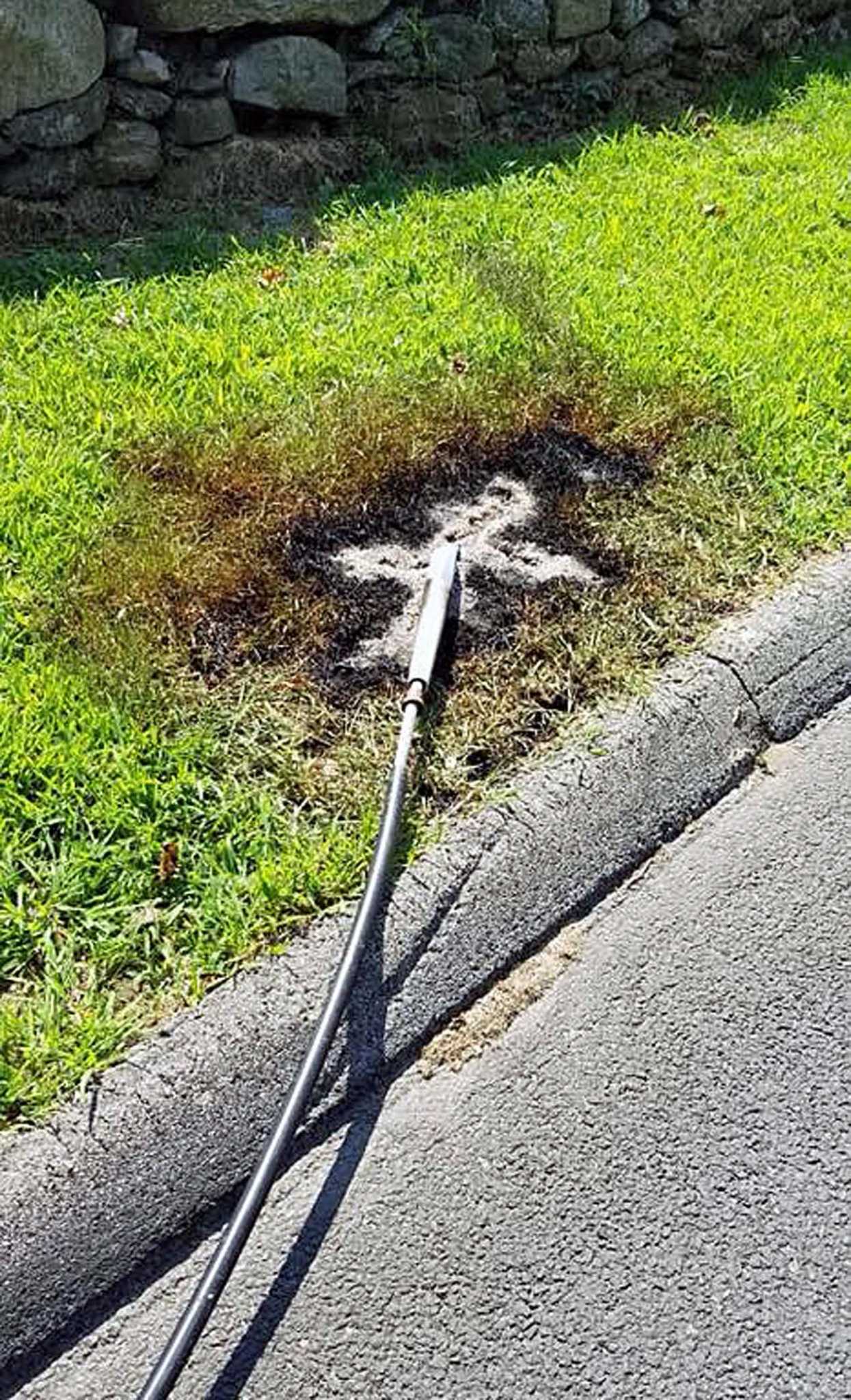Power line burned through asphalt in Westport