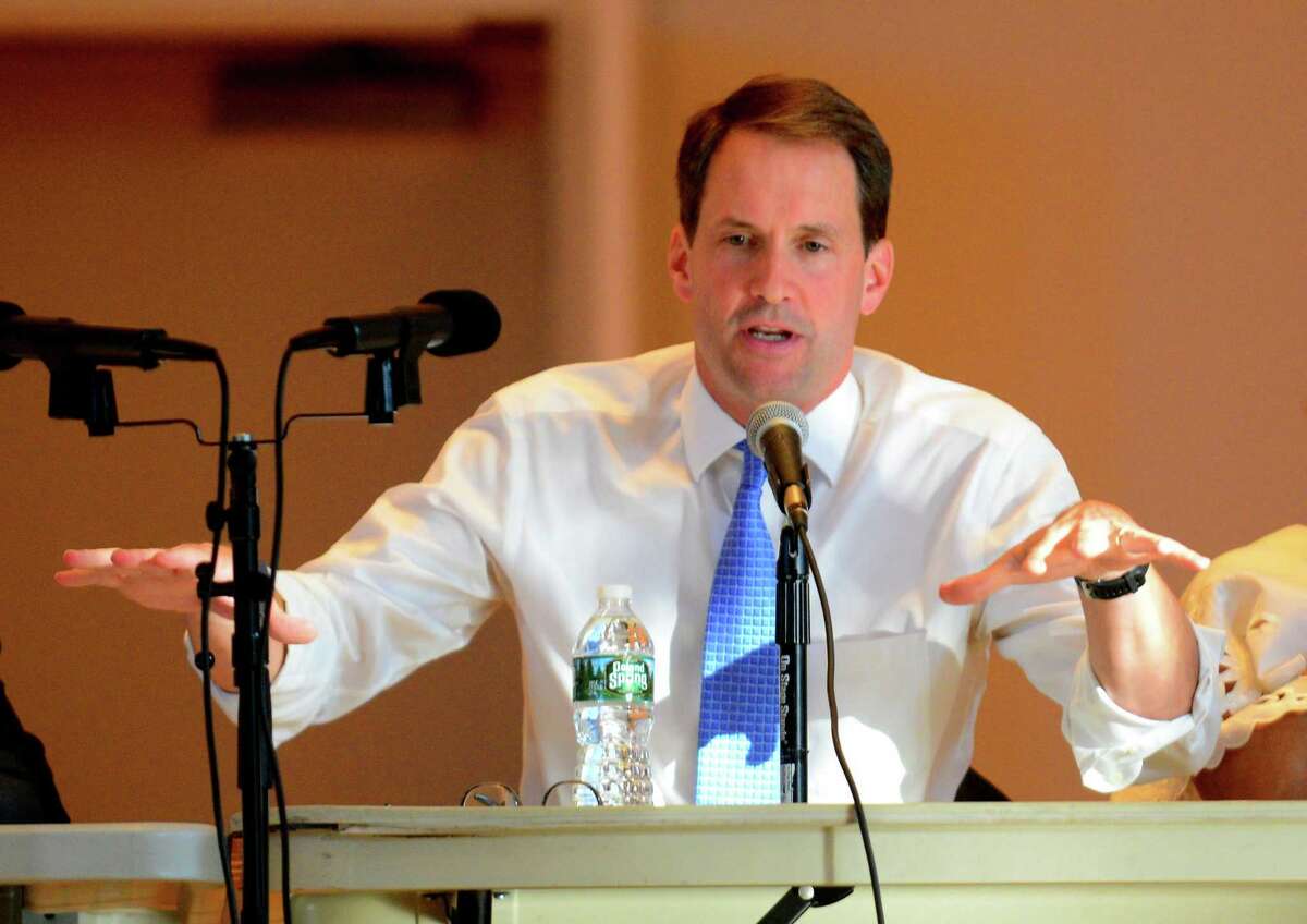 Himes, Arora take opposite sides at Norwalk town hall
