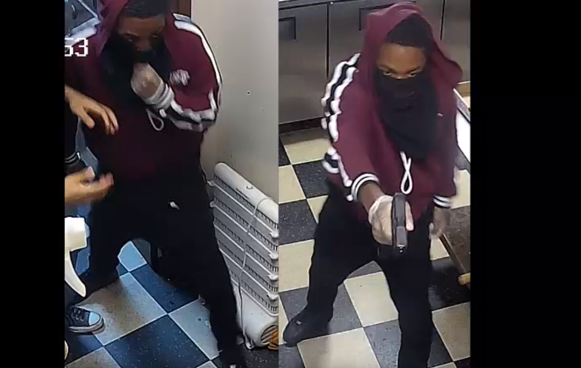 Armed suspects in violent pizza store robbery caught on camera