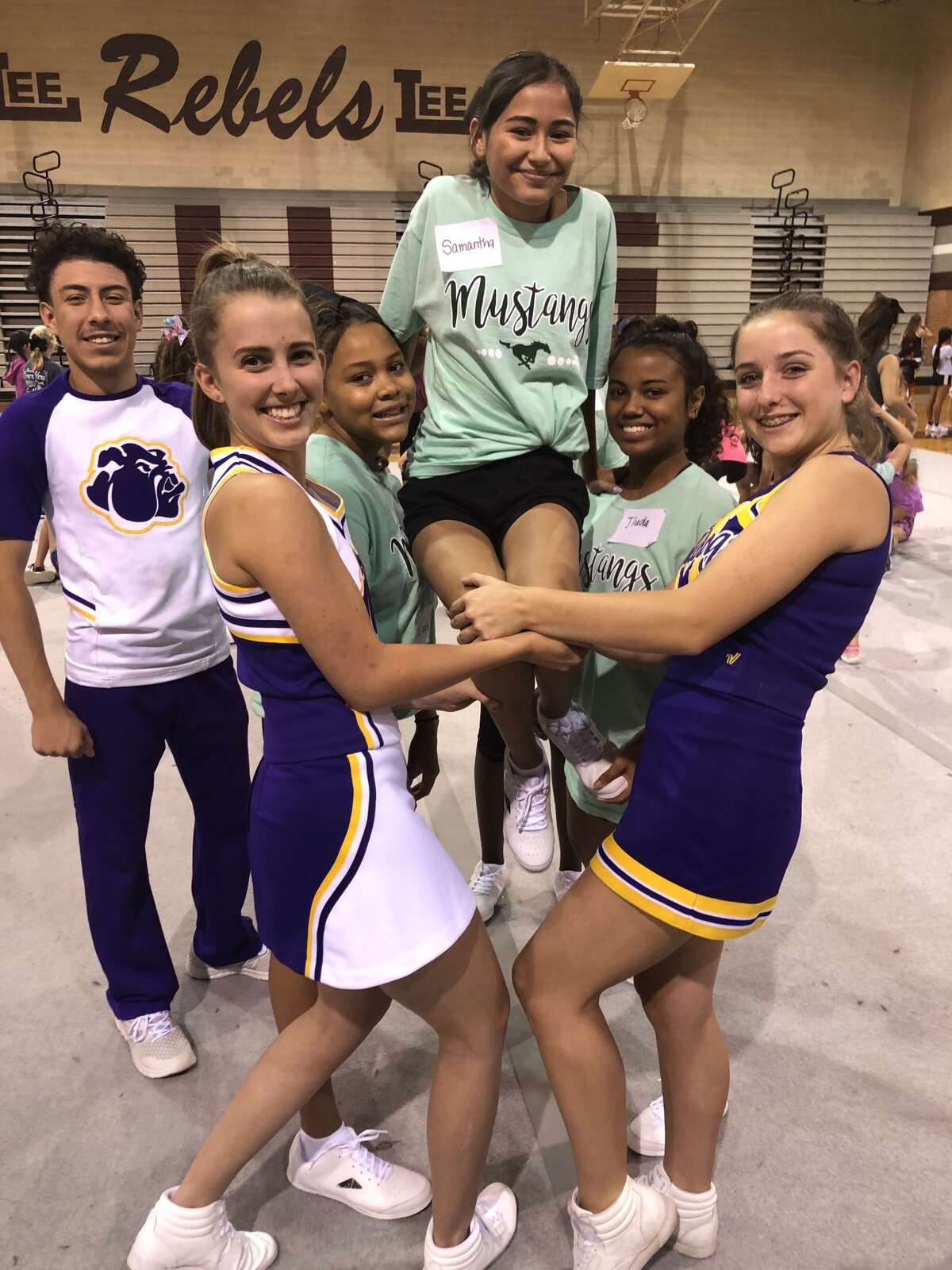 OUT & ABOUT: MISD cheerleaders teach younger kids, Curious George joins ...