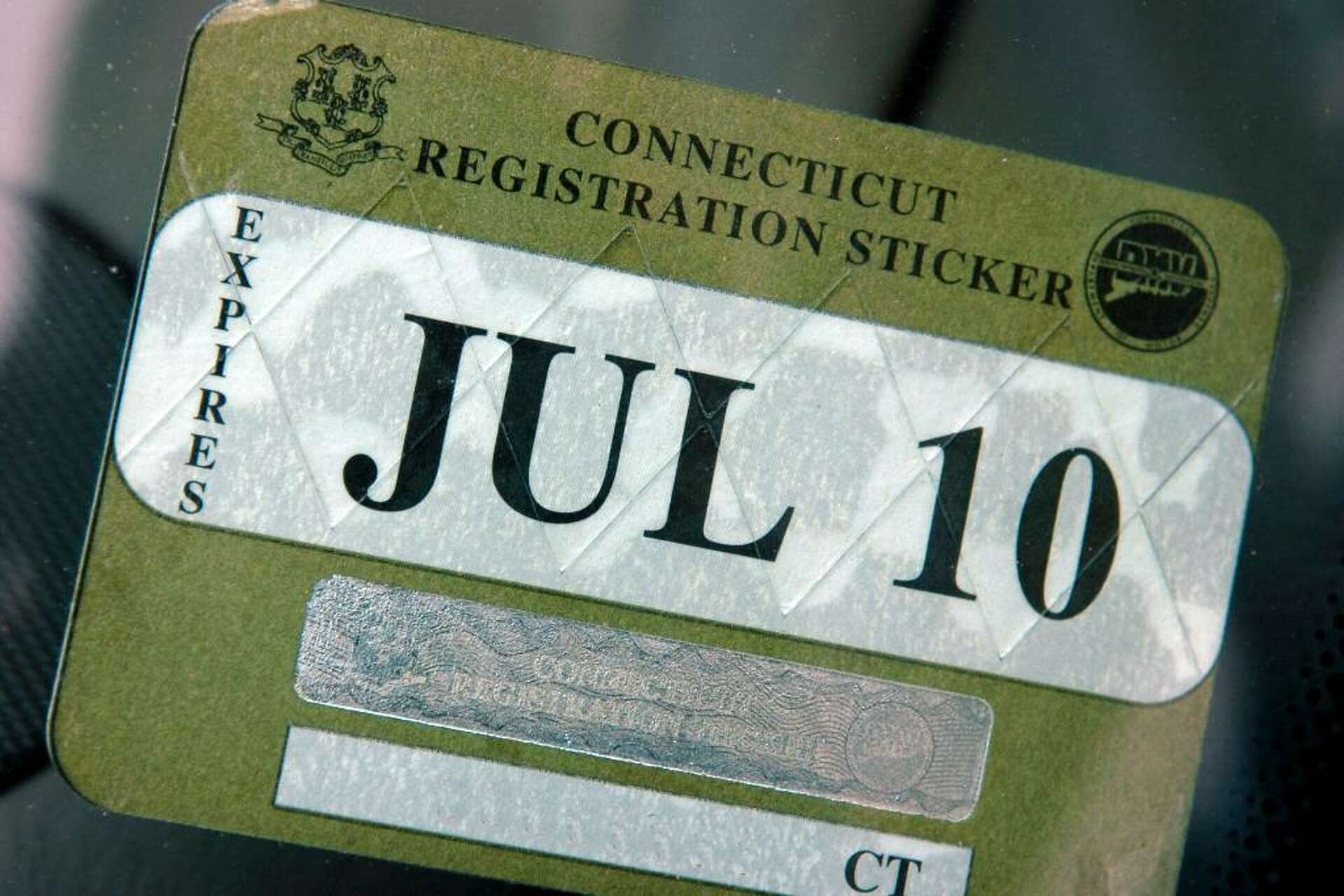 DMV plans to halt registration stickers