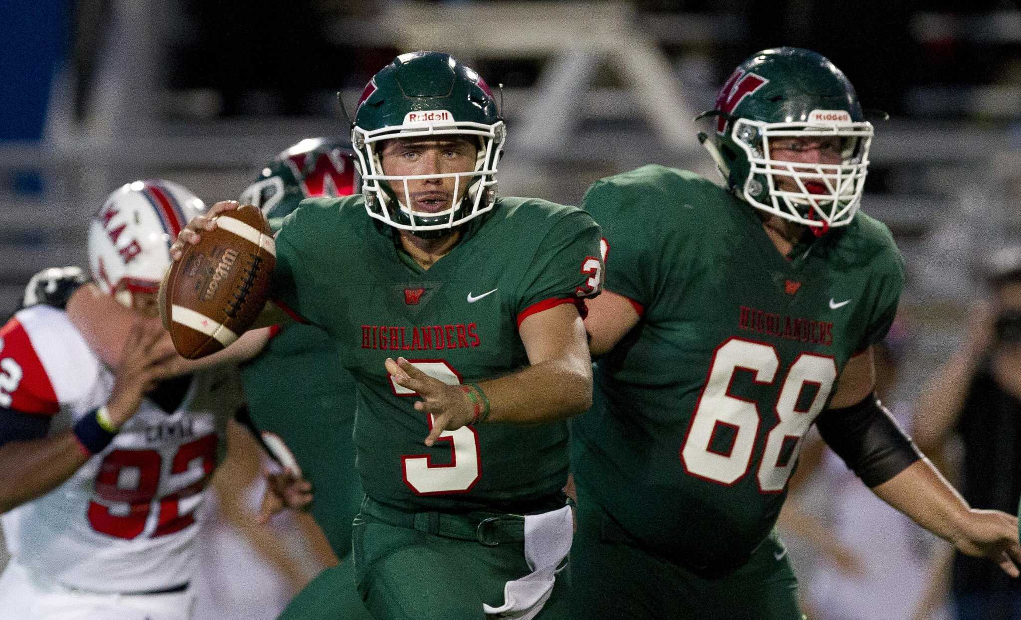 FOOTBALL: The Woodlands quarterbacks are sharing the workload
