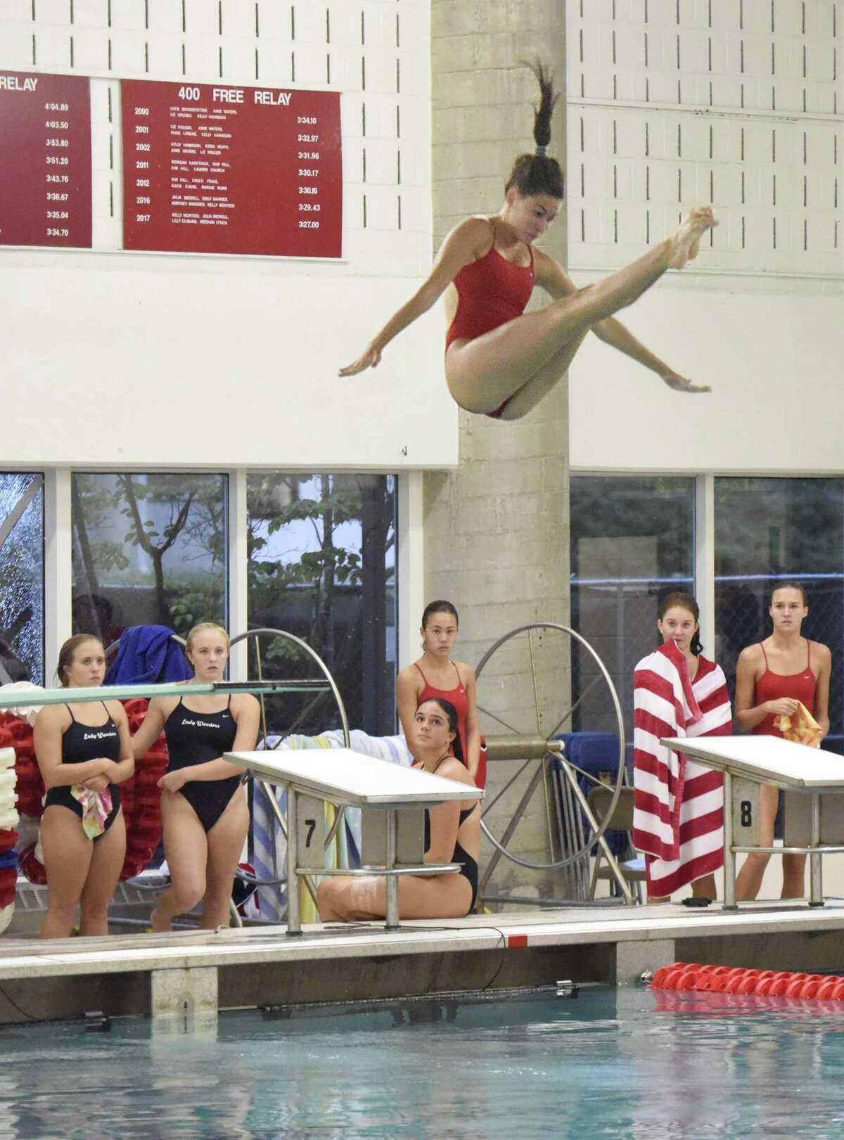 Greenwich girls swimming team edges Wilton
