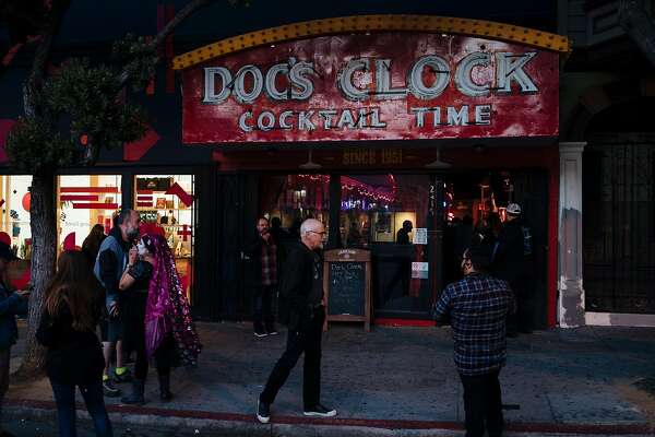 At long last, the famously contested Doc’s Clock sign lights up again ...