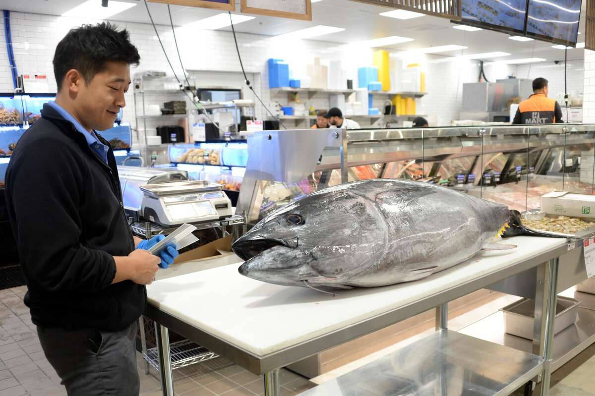 Residents line up for opening of long awaited H Mart store anchoring ...
