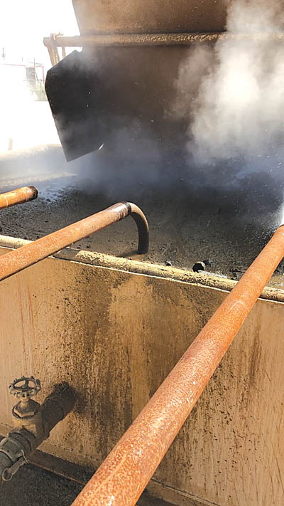 Steam process completely cleans paraffin from pipe