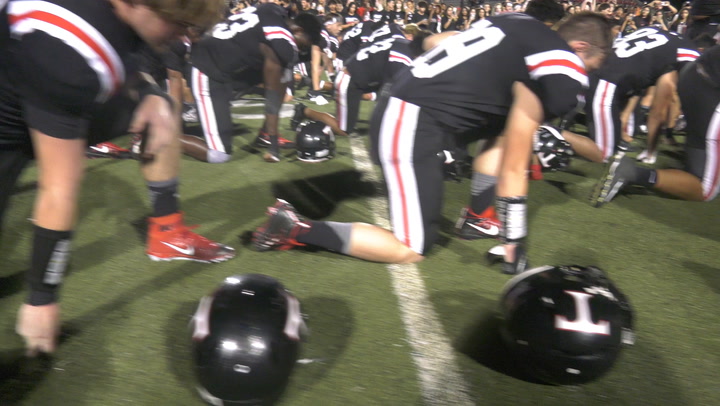 Video shows Texas high school football team perform war dance