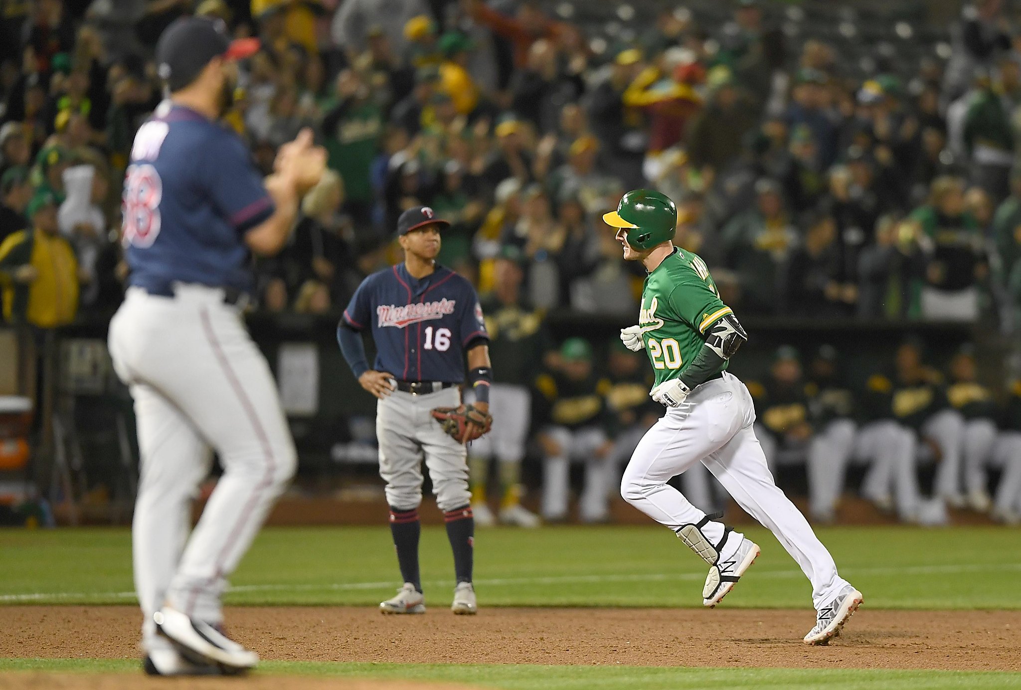 Mark Canha tweaks swing, makes impact for A’s as pinch-hitter