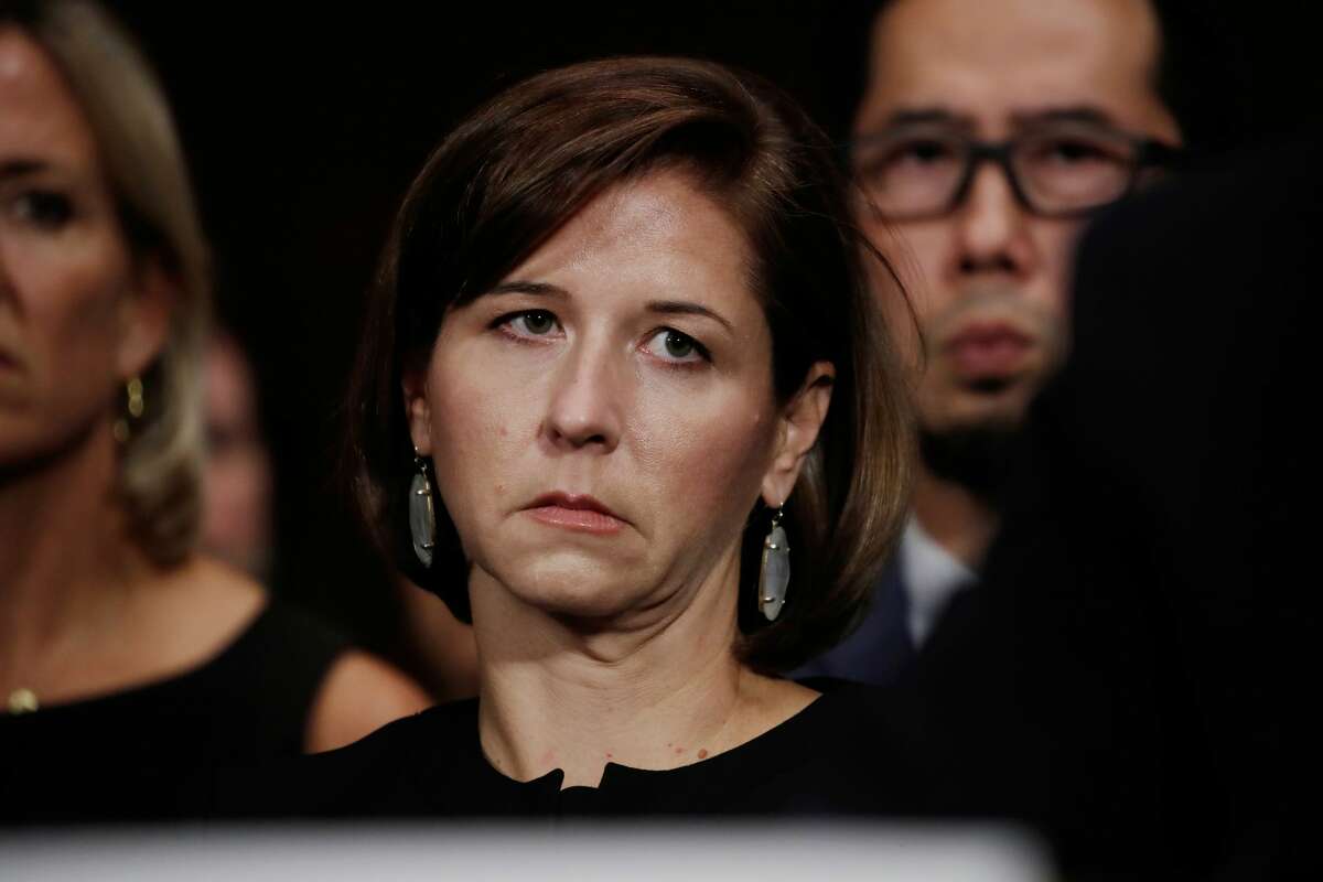 Poignant photo of women crying, scowling behind Kavanaugh goes viral