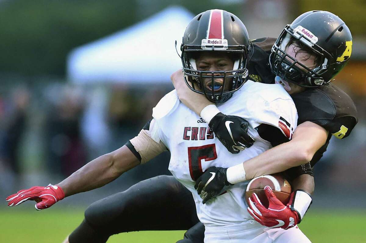 Amity football team scores SCC win over Wilbur Cross