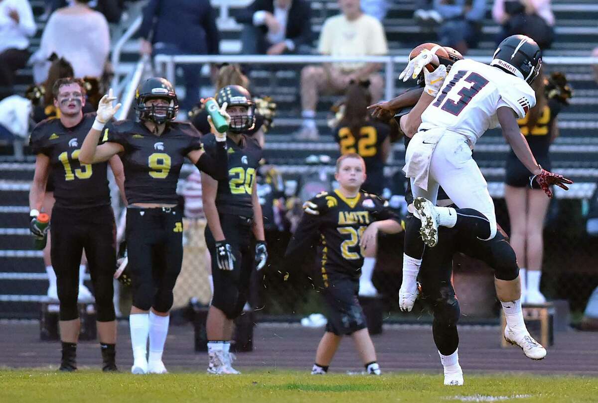 Amity football team scores SCC win over Wilbur Cross