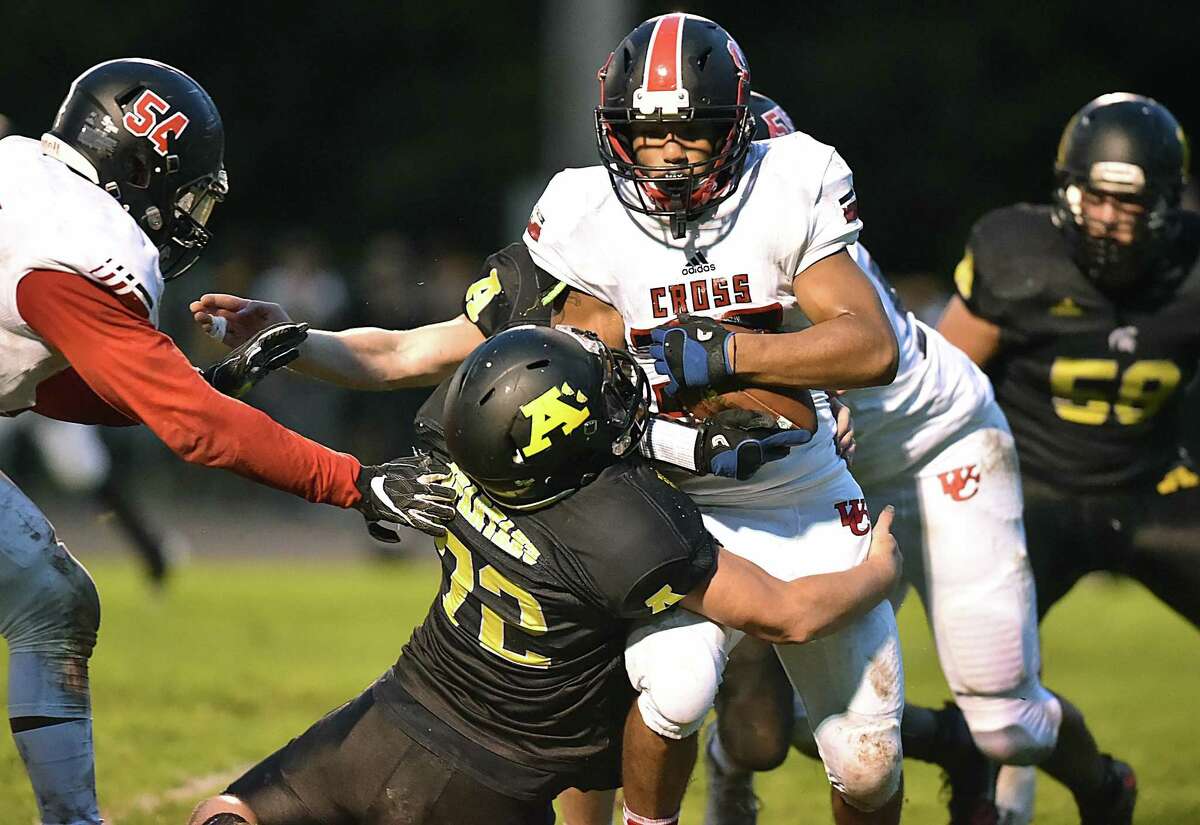Amity football team scores SCC win over Wilbur Cross