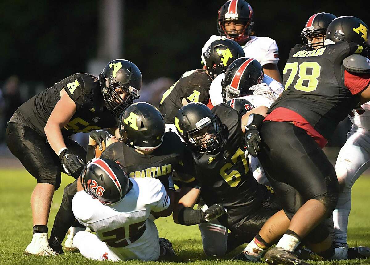 Amity football team scores SCC win over Wilbur Cross