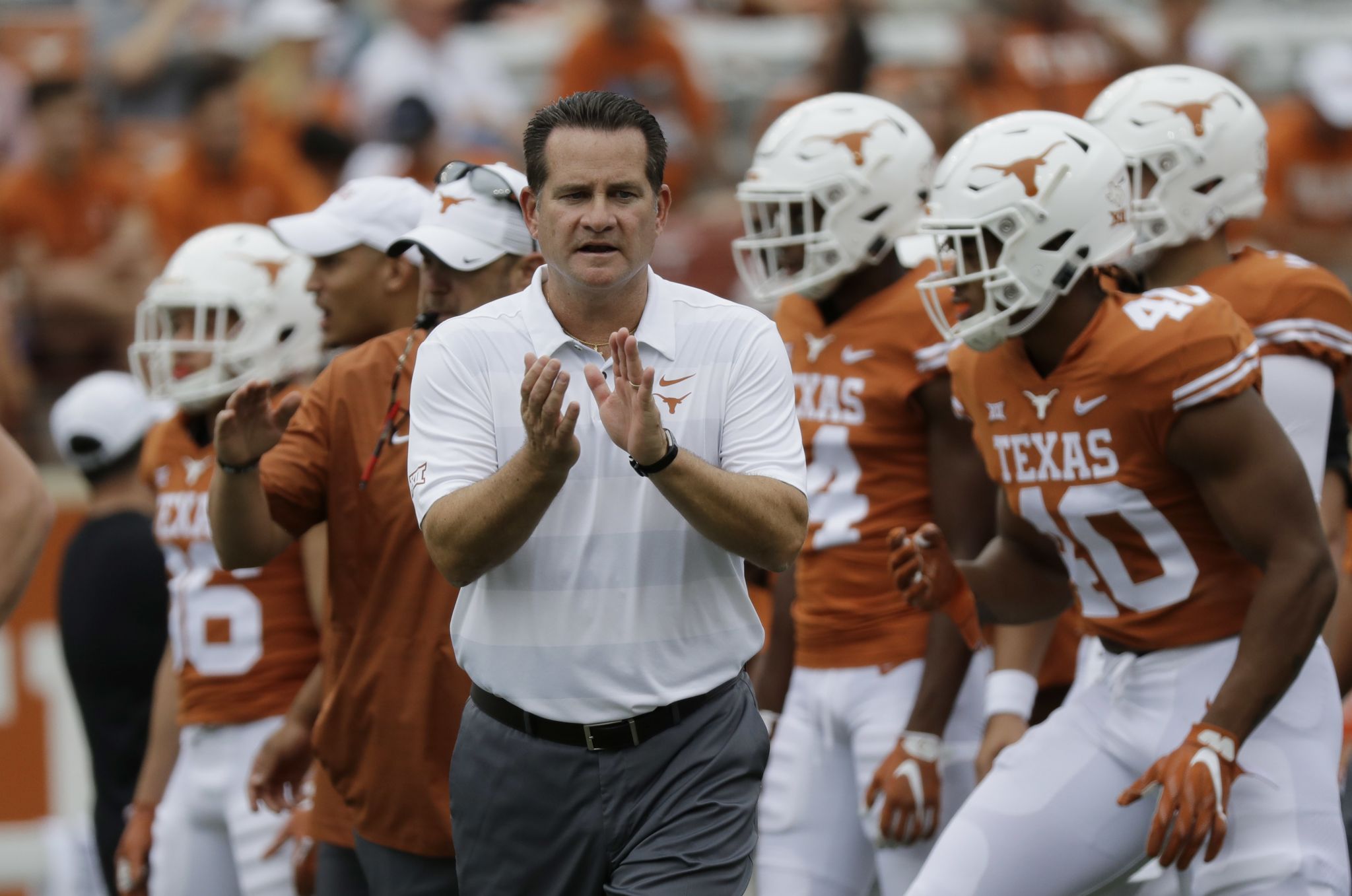 Texas OC Tim Beck will not travel with team for Kansas State game