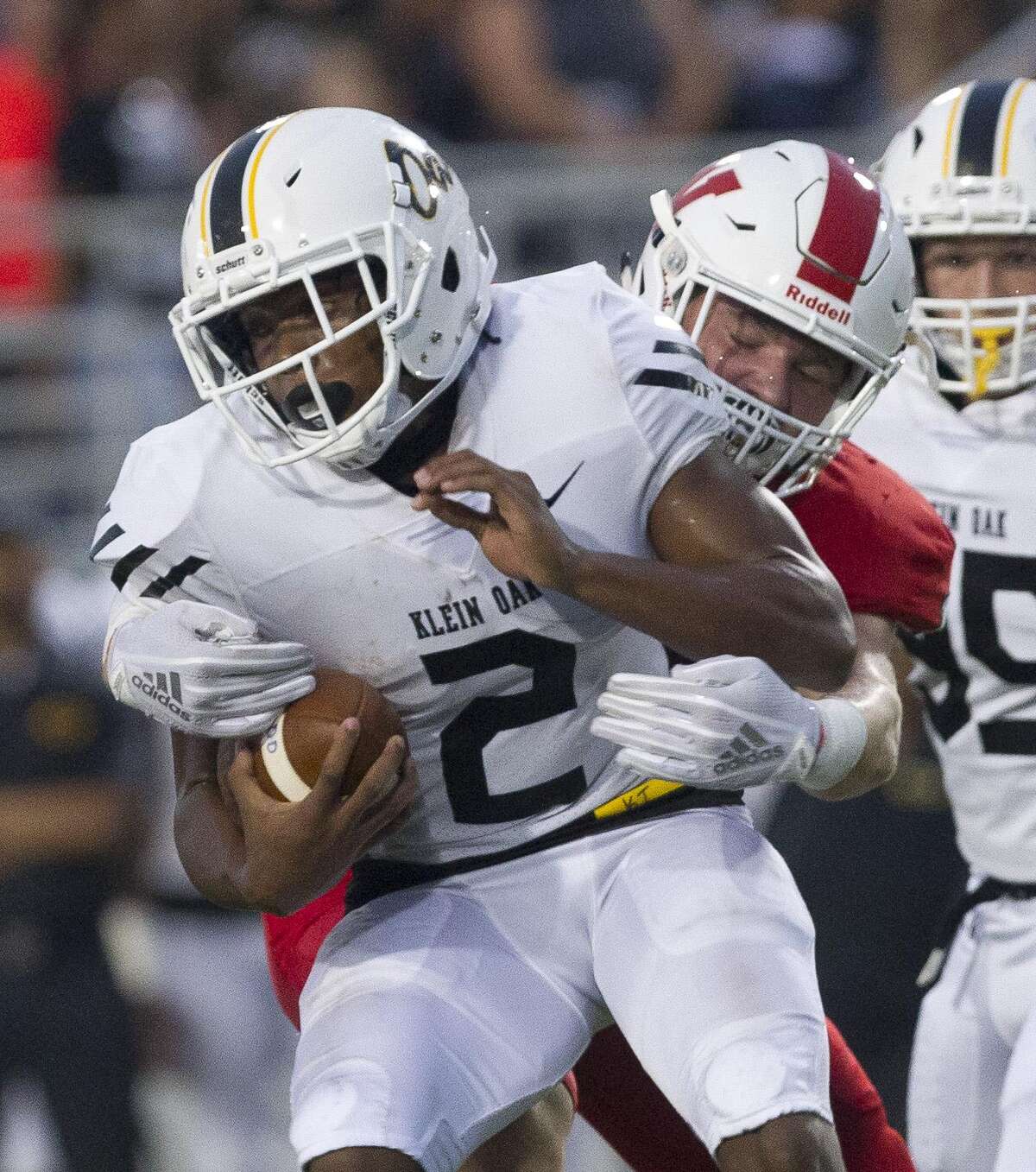 FOOTBALL: The Woodlands holds on for victory over Klein Oak