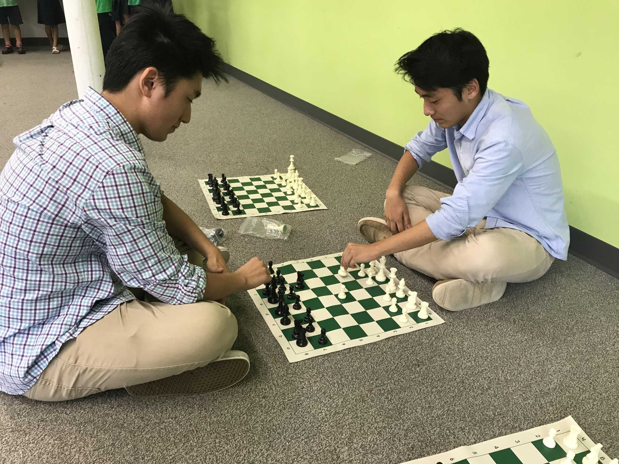 New Haven twins take chess to the classroom