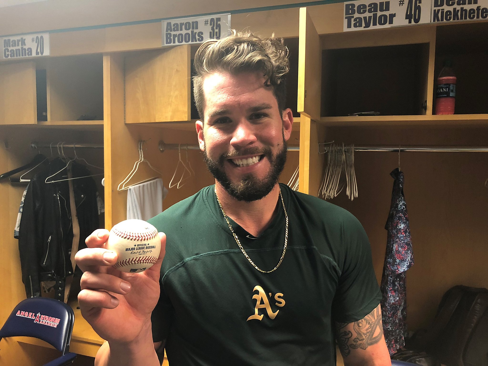 A’s Beau Taylor takes a tumble on first big-league hit