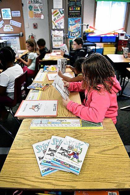 With help, teacher buys books for students