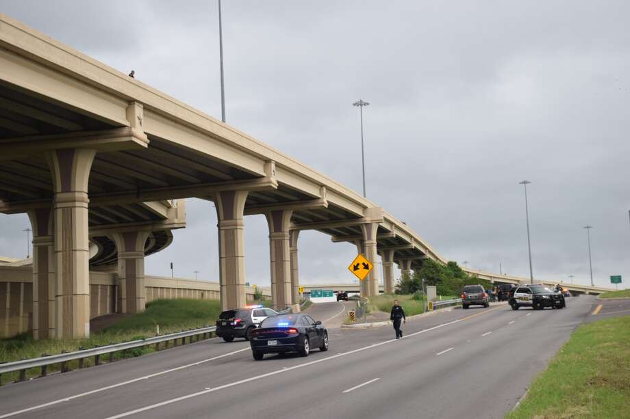 Major highway interchange reopens after man jumps from overpass ...