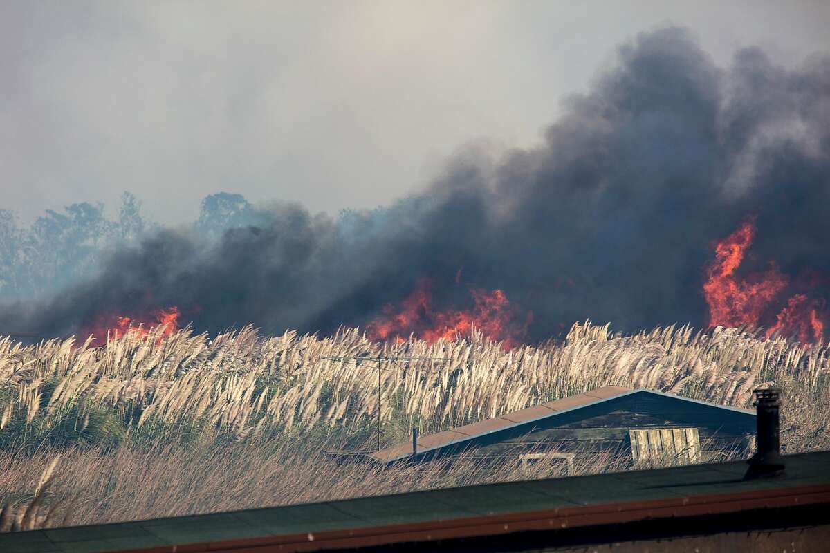 Wetlands complicate battle to extinguish smoky Solano County fire