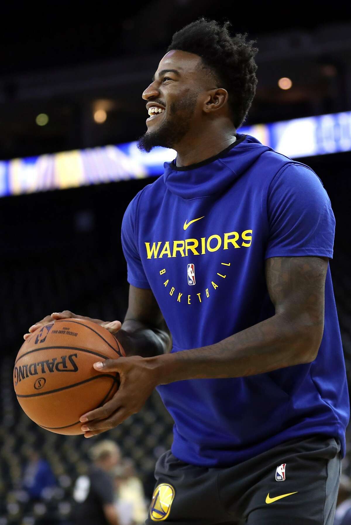 Warriors' Jordan Bell kisses fan who got nailed by ball