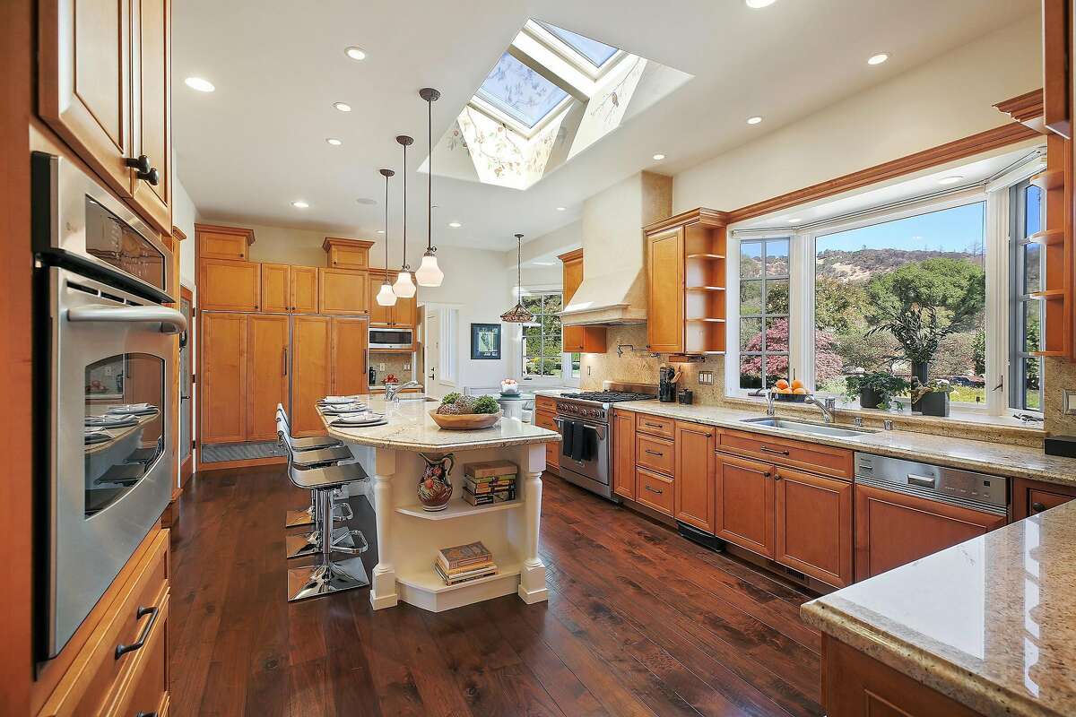 Walk-through: Octagonal sun room, sumptuous owner’s suite await in two ...