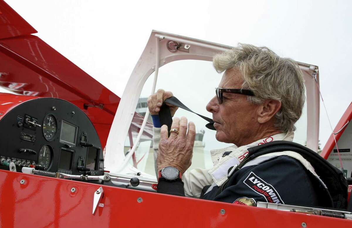 Final solo act in Houston skies for pilot, Smithsonian-bound biplane