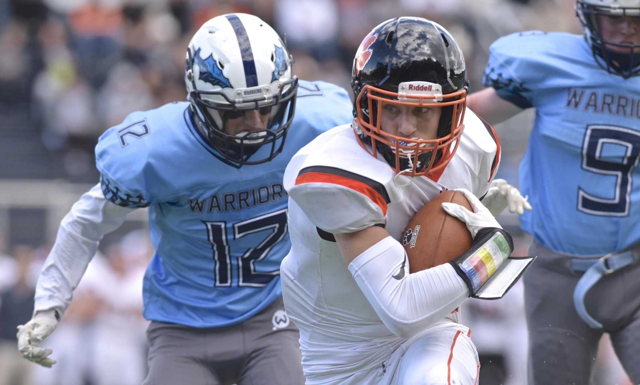 Ridgefield holds off rival Wilton in football thriller